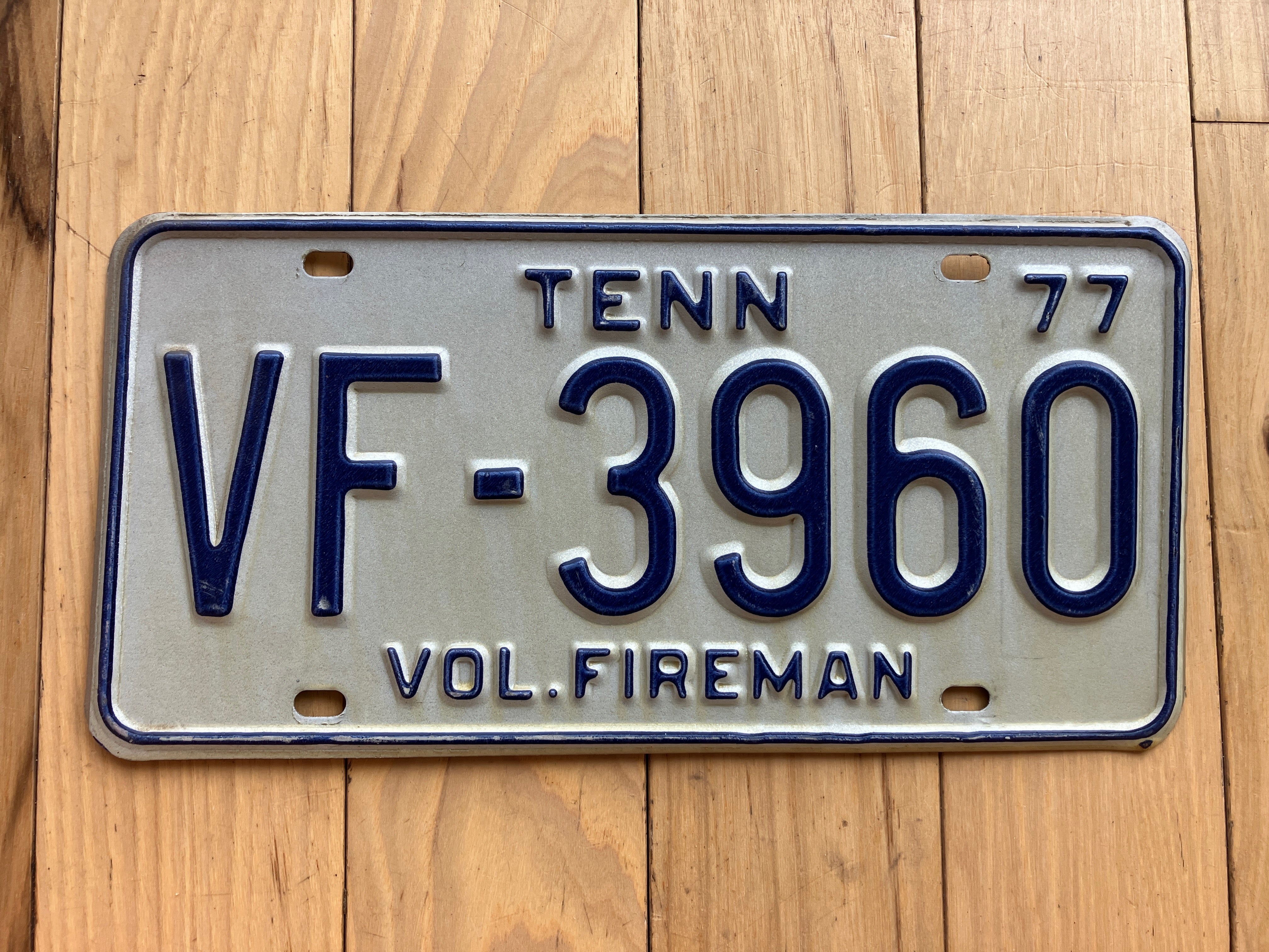 1977 Tennessee Volunteer Fireman License Plate – RusticPlates
